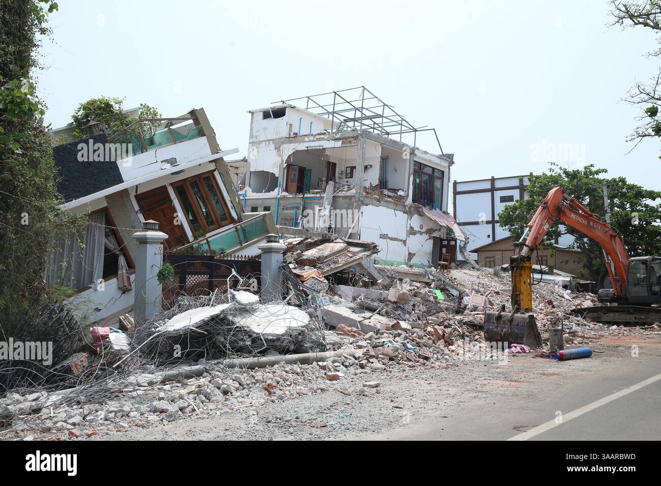 Sagaing, Myanmar. 1st Apr, 2025. Damaged buildings are pictured in ...