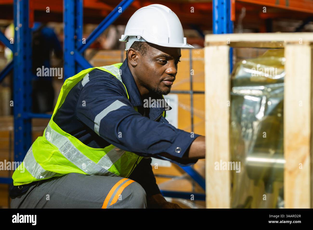african black professional warehouse worker. stock inventory staff employee working in cargo ...