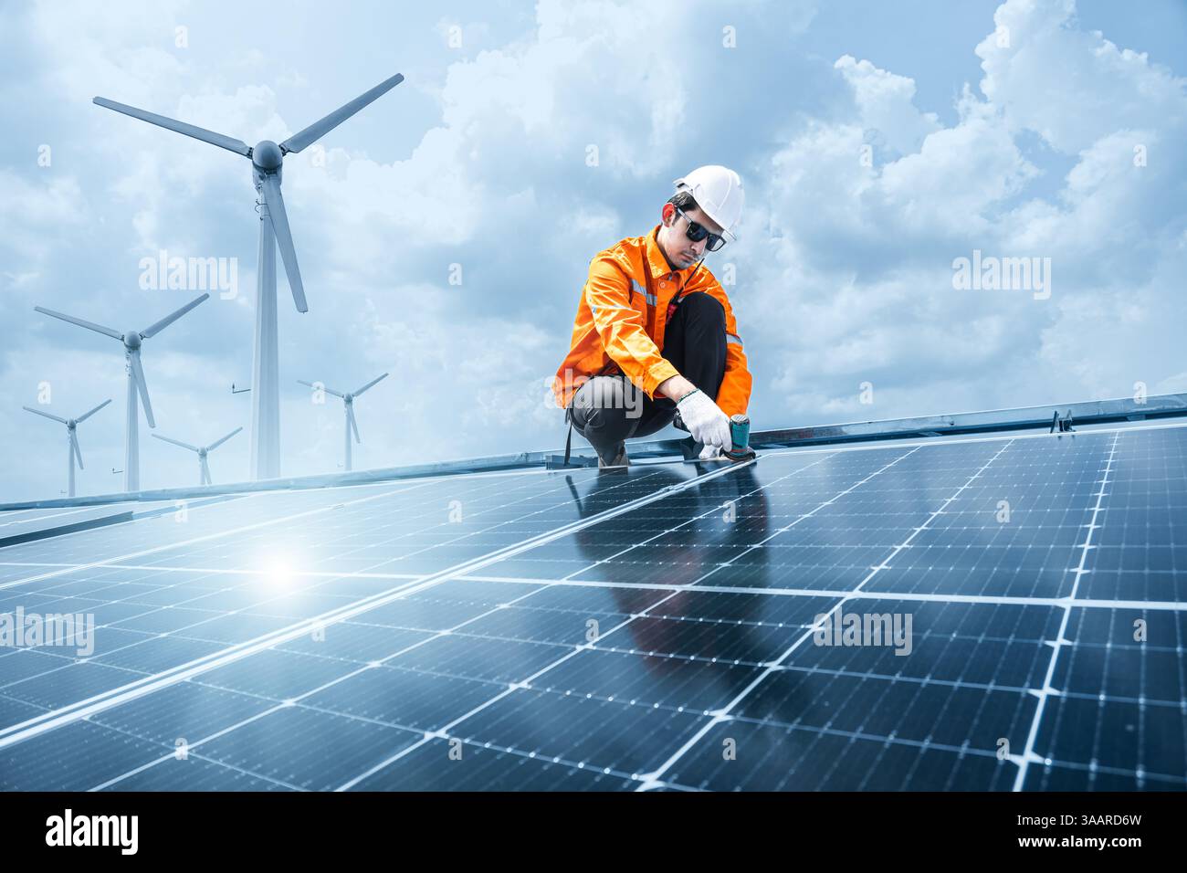Engineer install Solar panels with wind turbine on blue sky. New ...