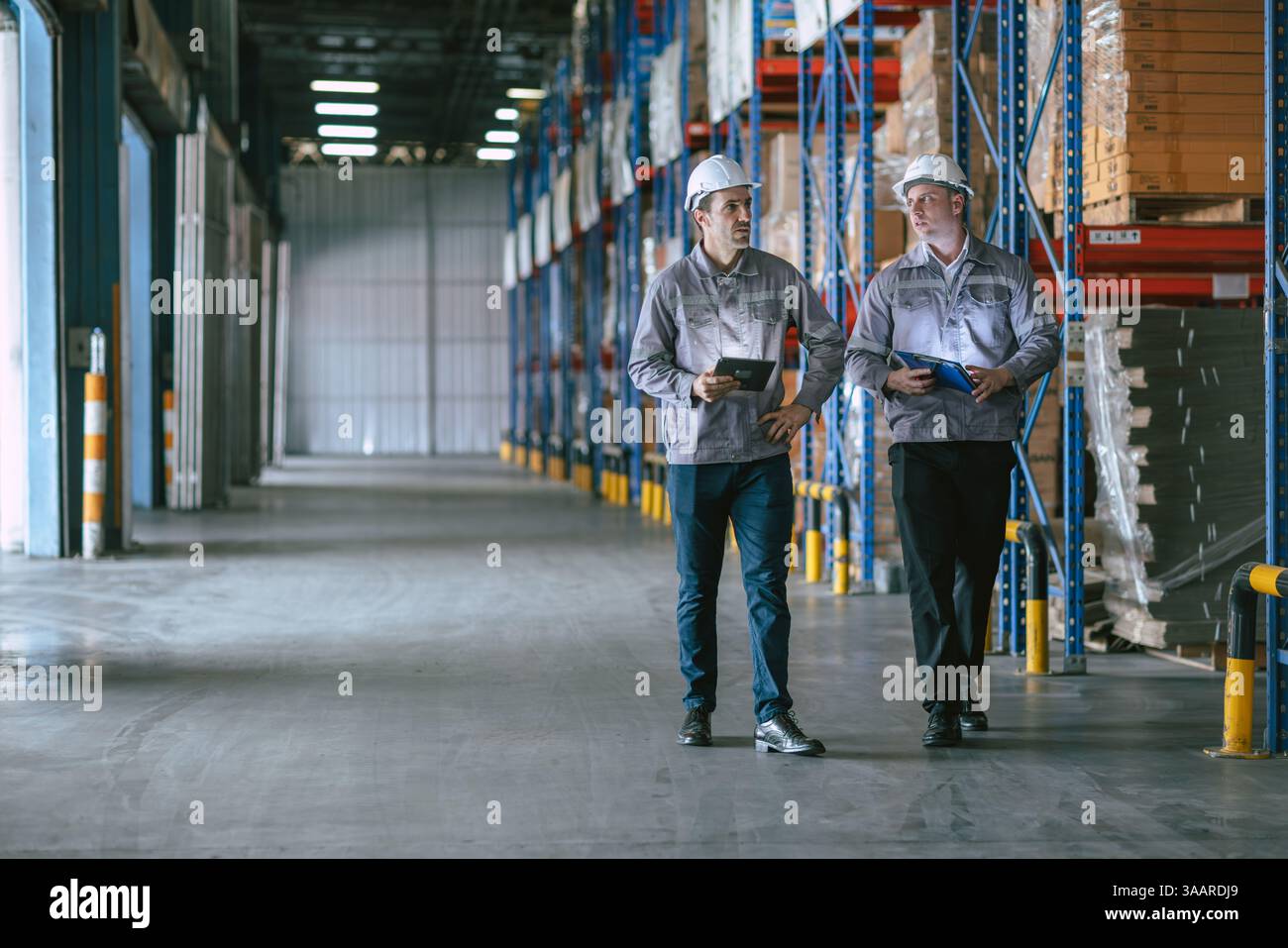 Warehouse workers working together, Staff inventory employee team in ...