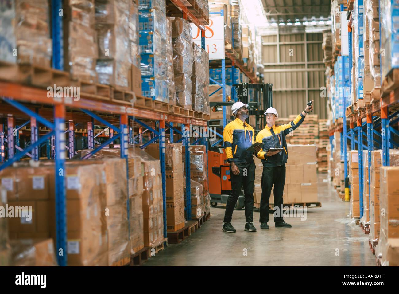 Warehouse workers working together, Staff inventory employee team in ...