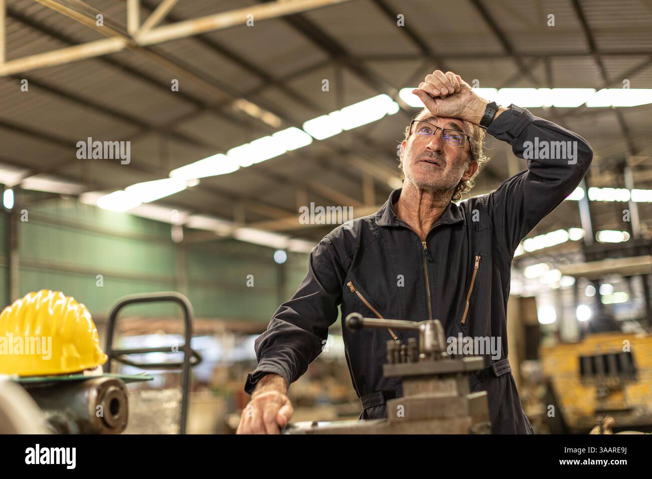 Senior worker tired exhausted headache pain suffer from hard work in ...