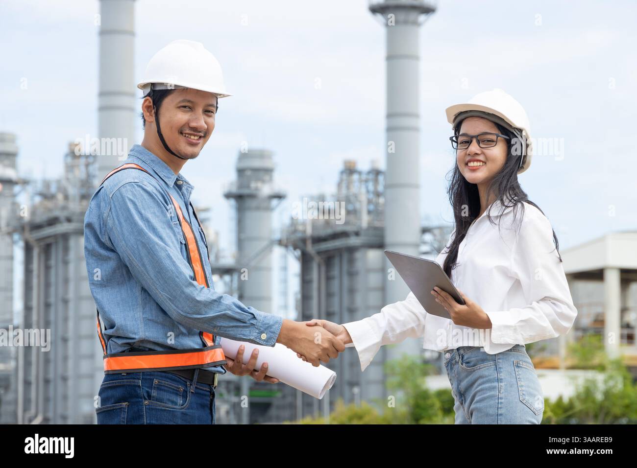 Professional Petroleum Refinery engineer team hand shaking together ...