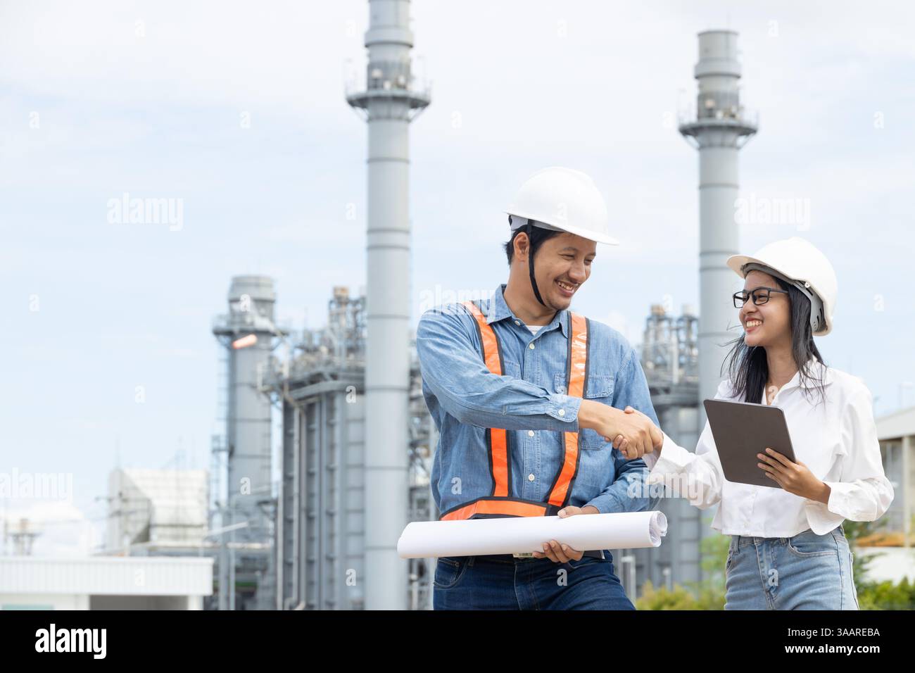 Professional Petroleum Refinery engineer team hand shaking together ...