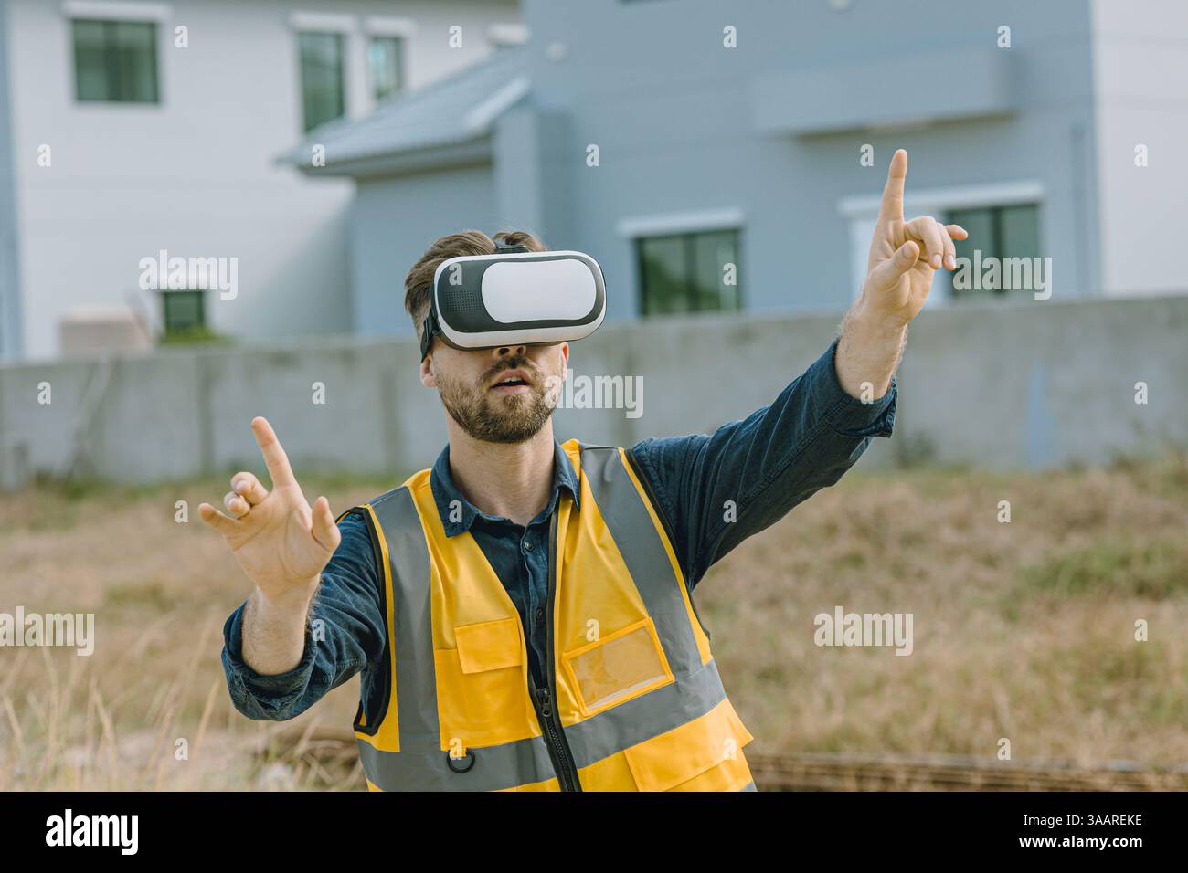 Engineer male worker using Visual reality VR or Augmented reality AR ...