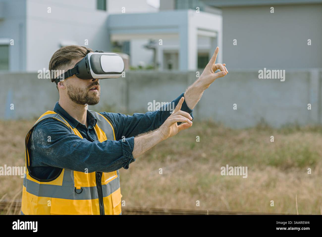 Engineer male worker using Visual reality VR or Augmented reality AR ...