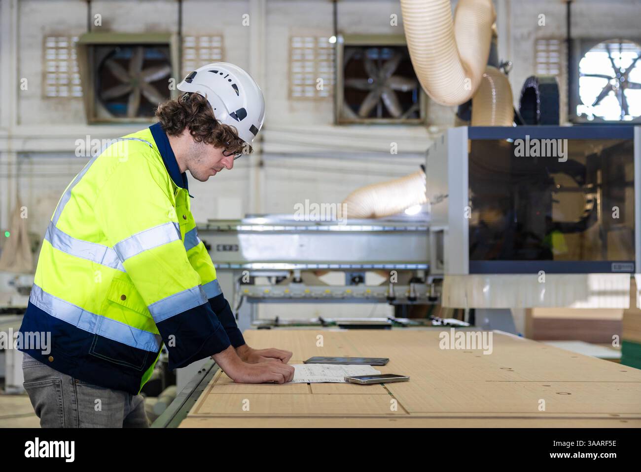 Professional technician engineer male staff worker looking at product ...