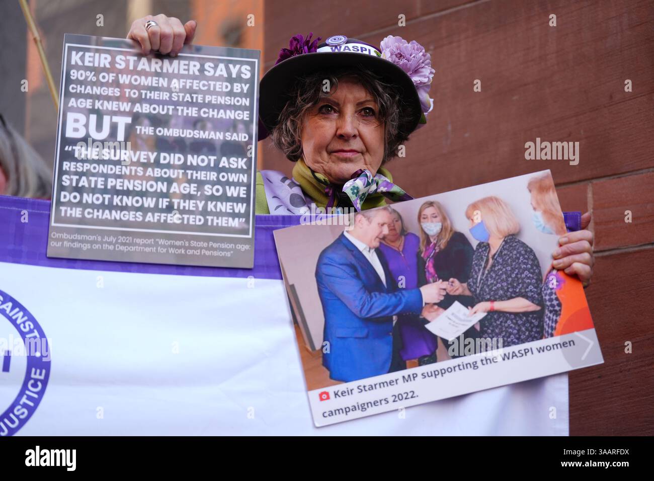 A person takes part in national day of action over energy bill hikes ...