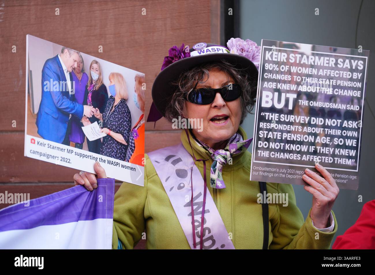 A person takes part in national day of action over energy bill hikes ...
