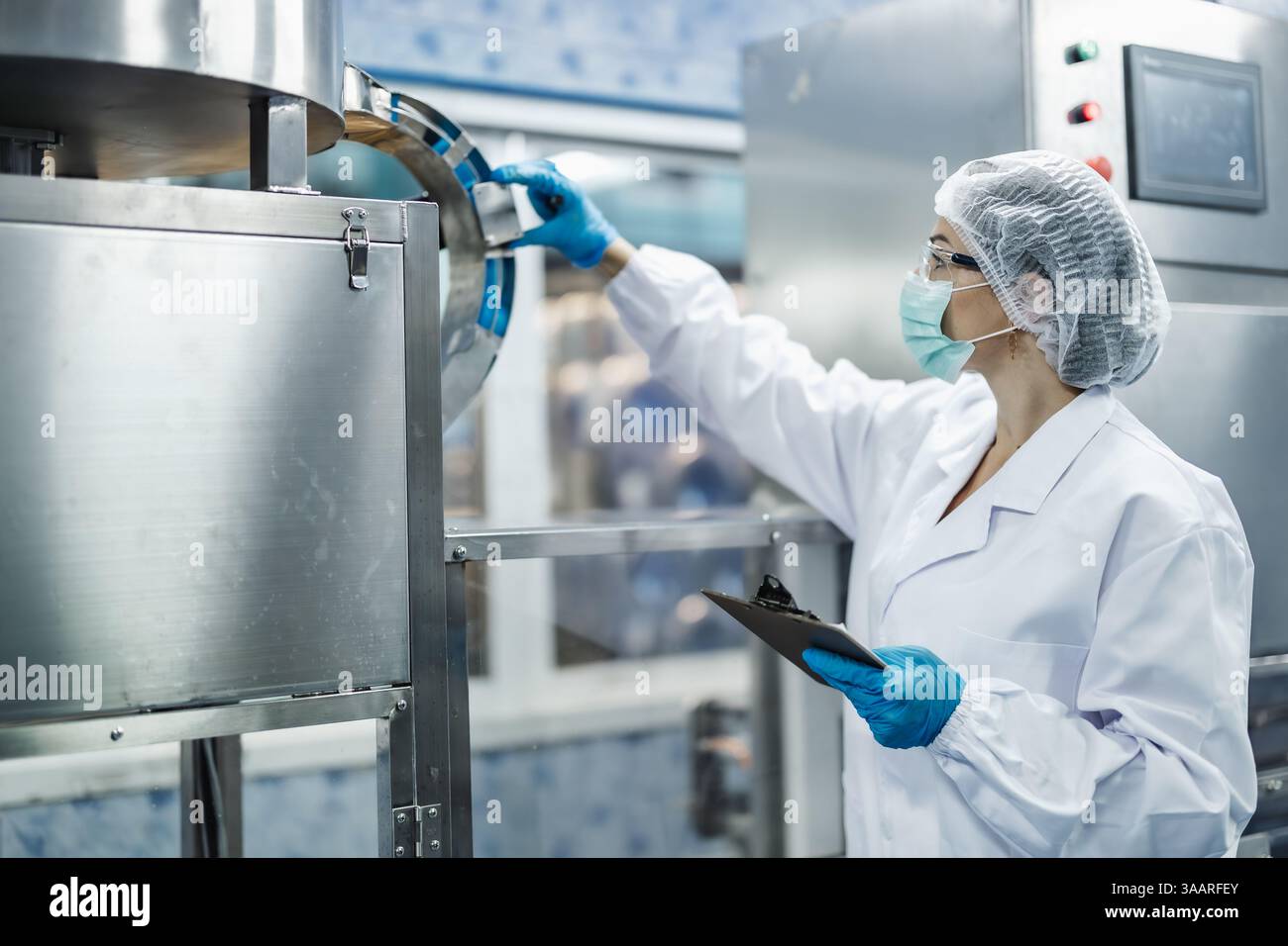 Industry inspector team working, QC staff work checking machine operation for safety and hygiene ...