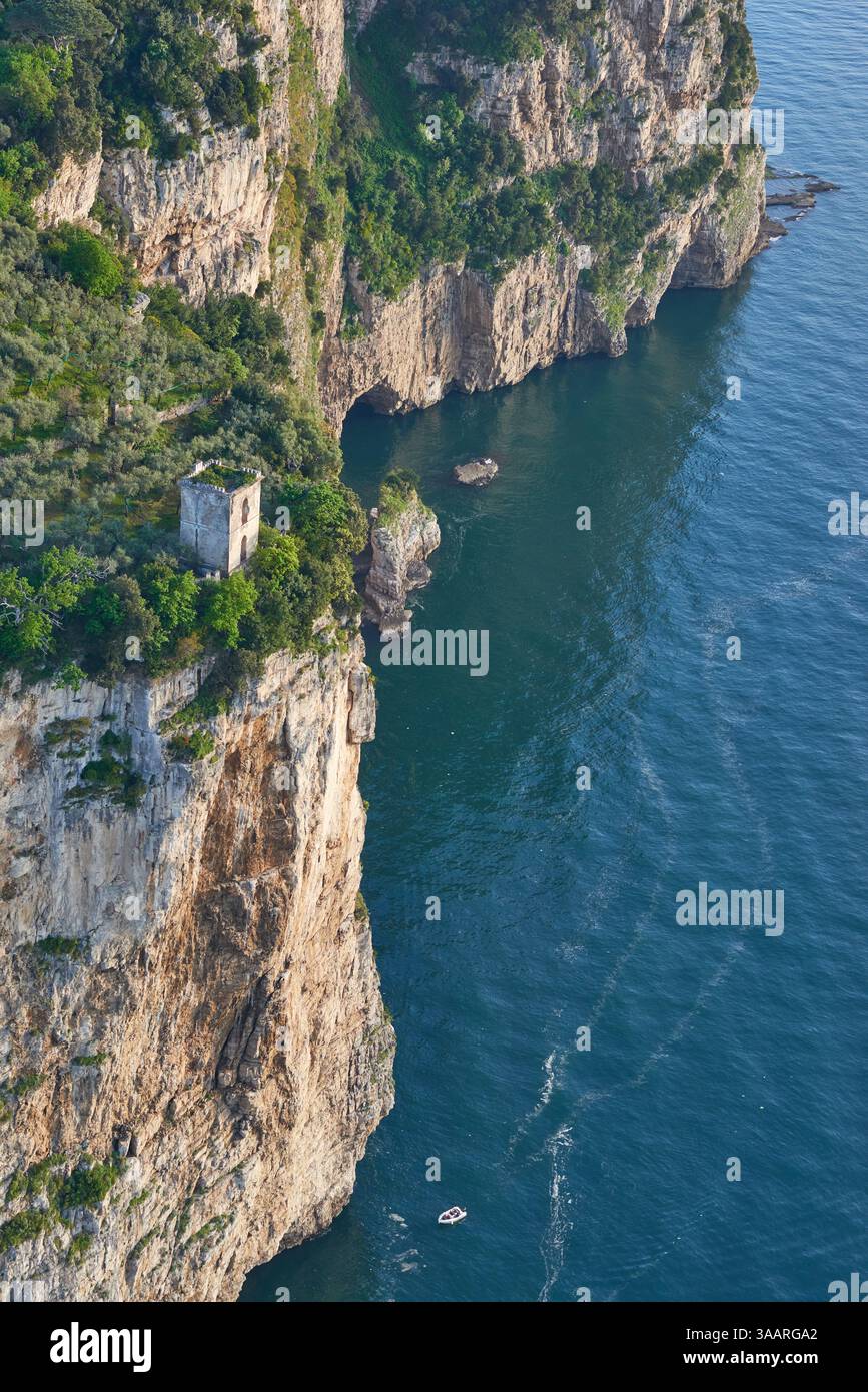 AERIAL VIEW. Torre (Tower) di Punta Scutolo at the top of a precipitous ...