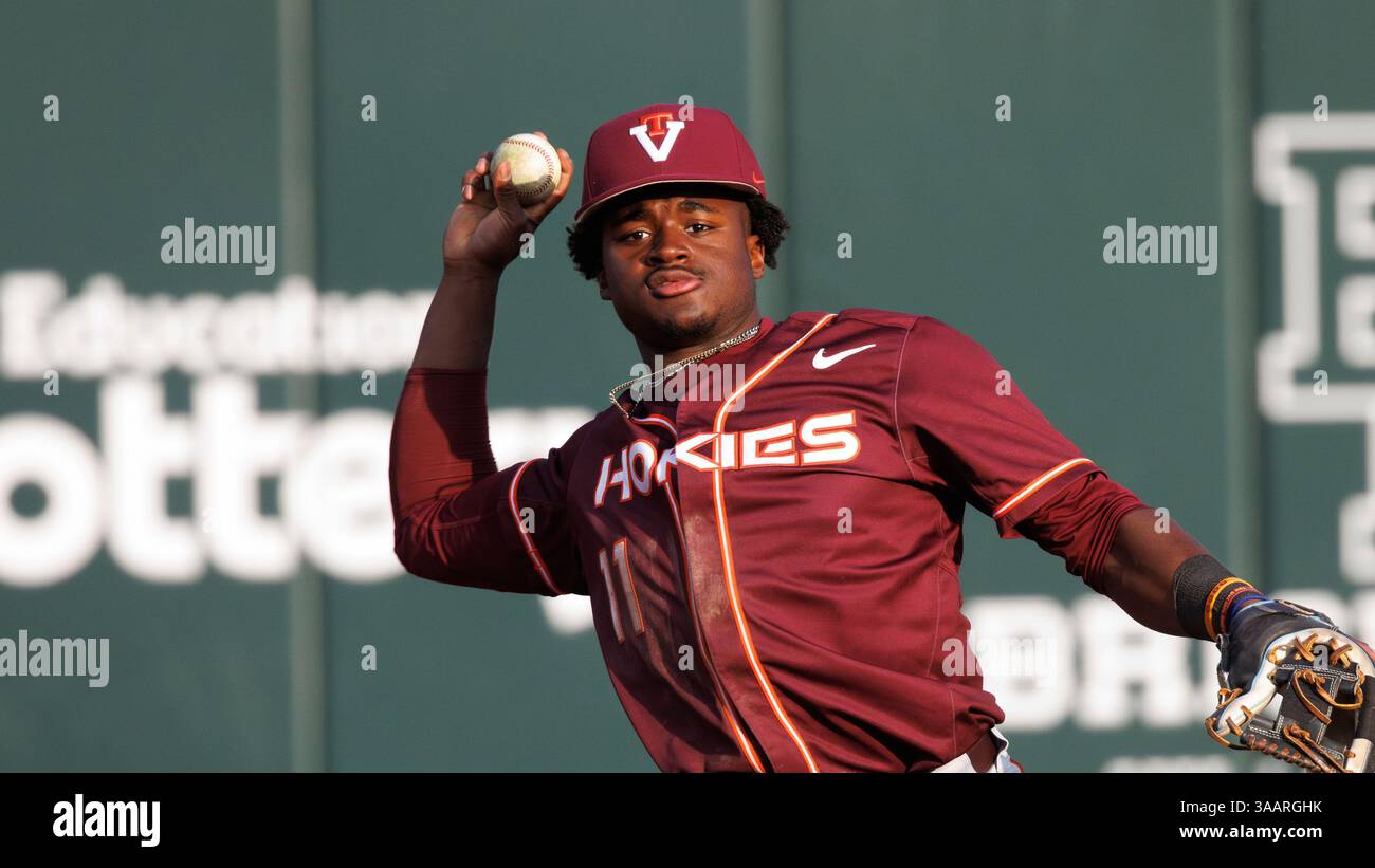 Virginia Tech's Jared Davis (11) makes a throw during an NCAA baseball ...
