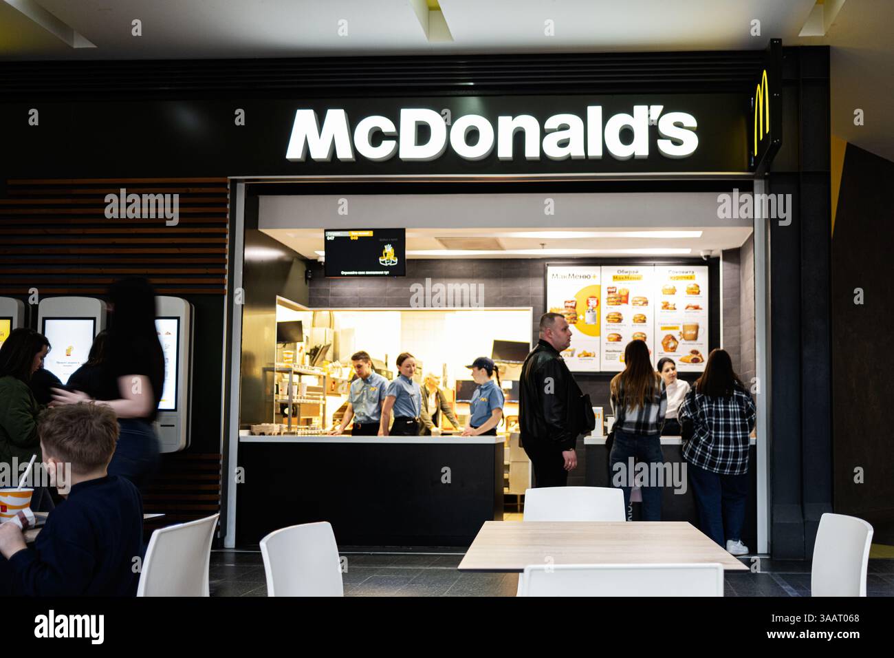Lviv, Ukraine - March 31, 2025: Customers being served at McDonald's ...