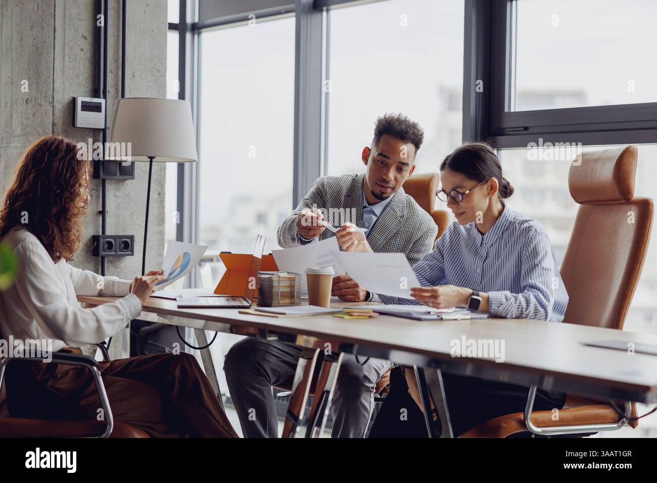 Engaging Collaborative Team Meeting in a Modern, Dynamic Office Setting for Ideas Exchange Stock ...