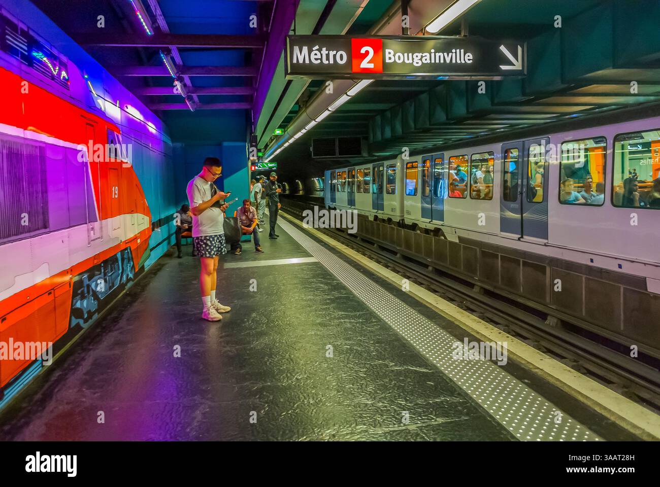 Marseille, FRANCE, Inside, Chinese Man inside, Looking at Smart Phone ...