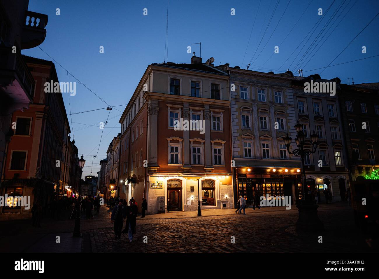 Lviv, Ukraine - March 31, 2025: Charming nighttime Lviv scene featuring ...