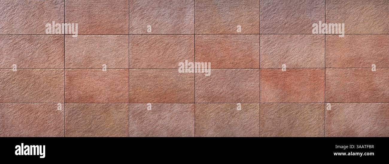 Wall cladding made of large reddish-brown rectangular stone slabs ...