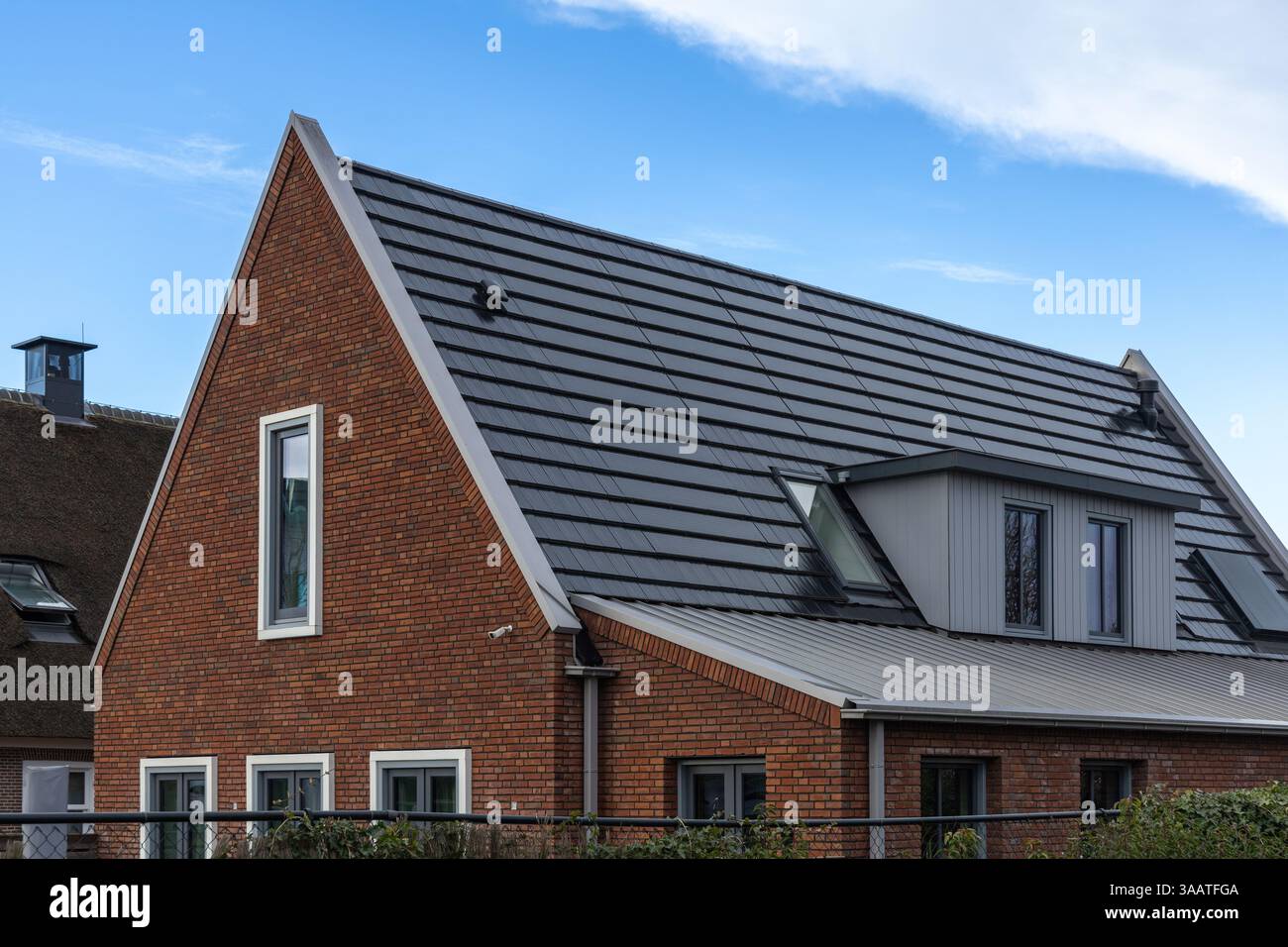 Integrated solar panels close up. Photovoltaic panels in the roof ...
