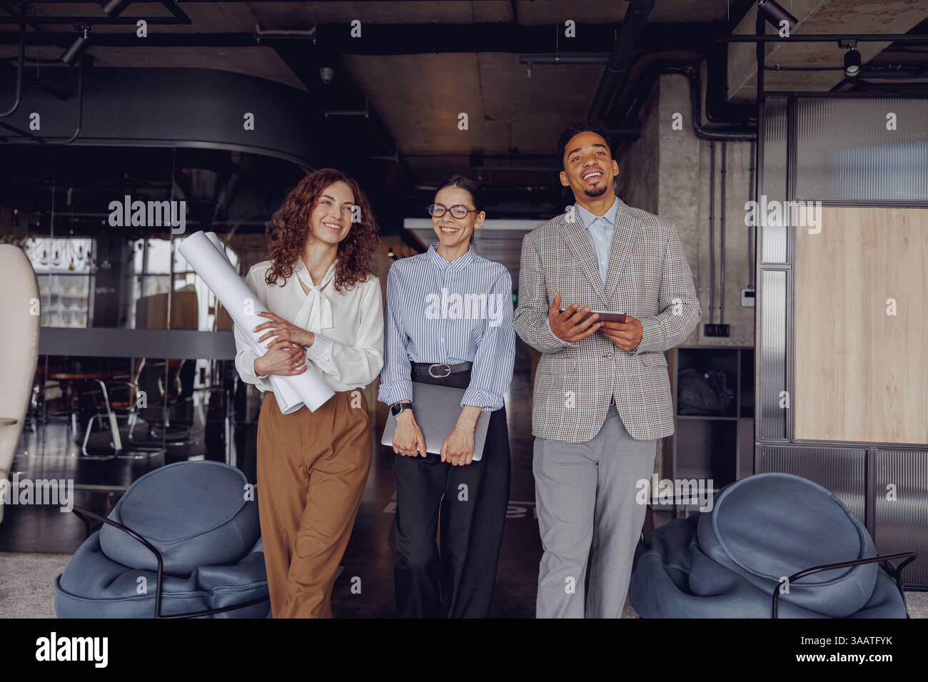 A Diverse Team Effectively Collaborating in a Modern Office Environment ...