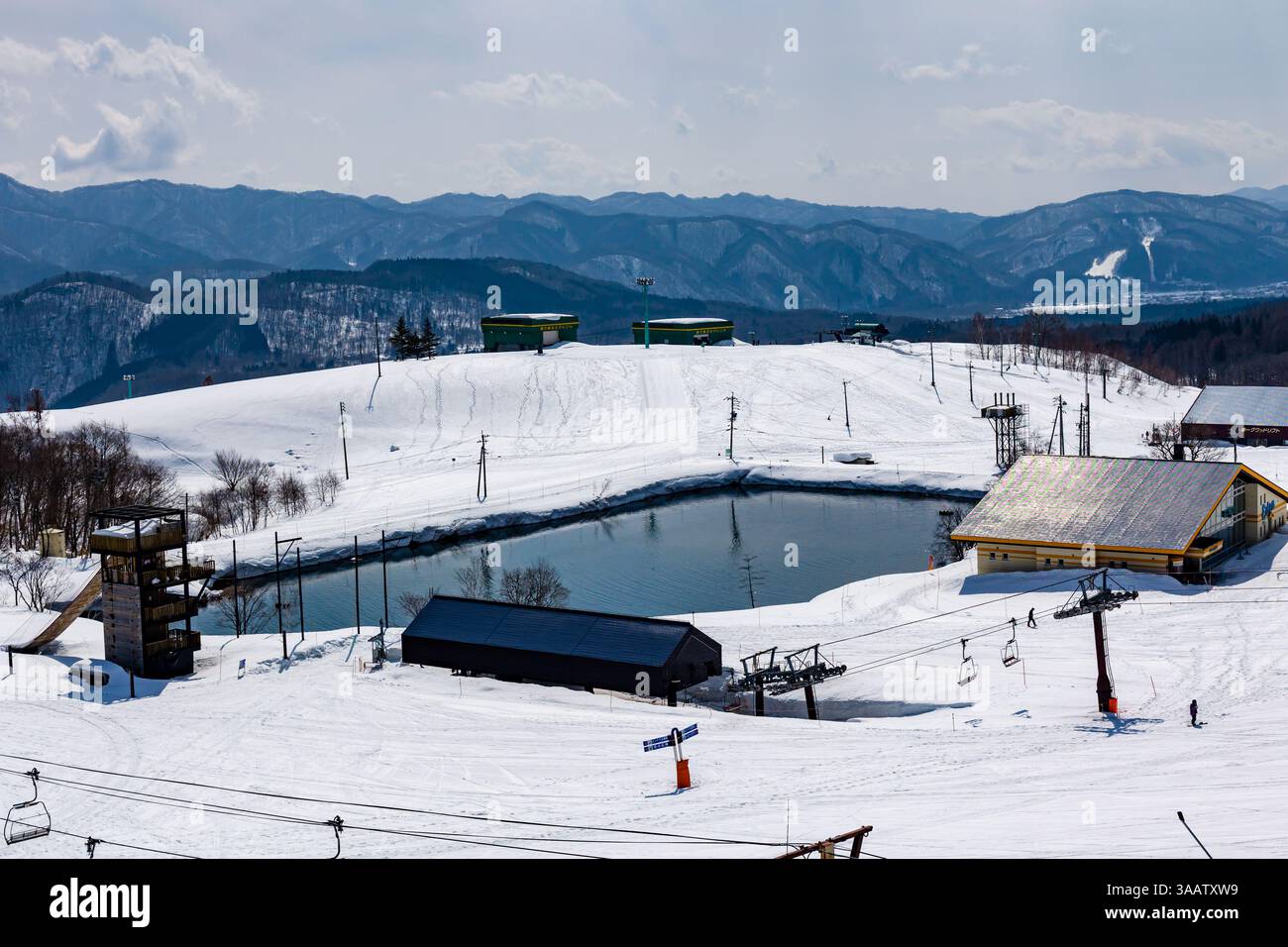 Pond and structures at Tsugaike Ski resort in Nagano, Japan Stock Photo ...