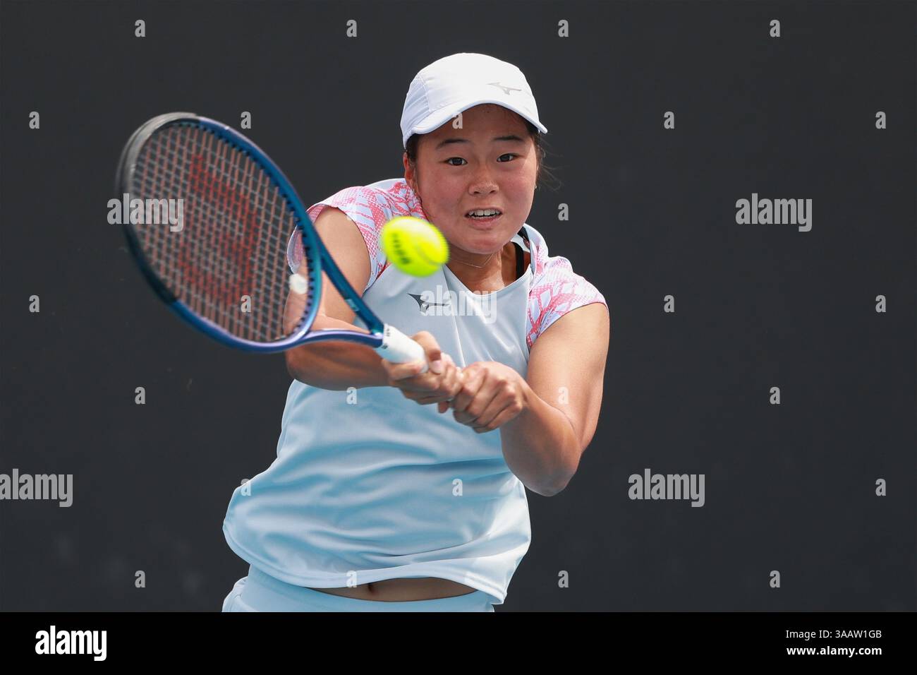 Japanese junior tennis player Wakana Sonobe (JPN) playing a backhand shot at the Australian Open ...