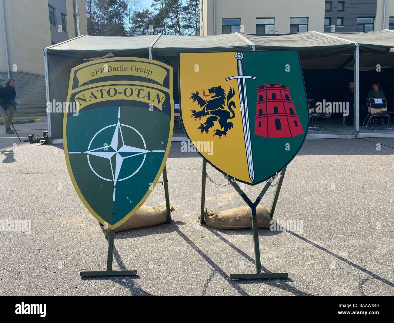 01 April 2025, Lithuania, Rukla: The official NATO emblem for the ...