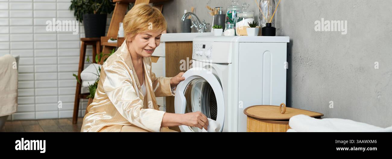 Beautiful senior woman happily checks her laundry while enjoying a tidy and stylish space Stock ...