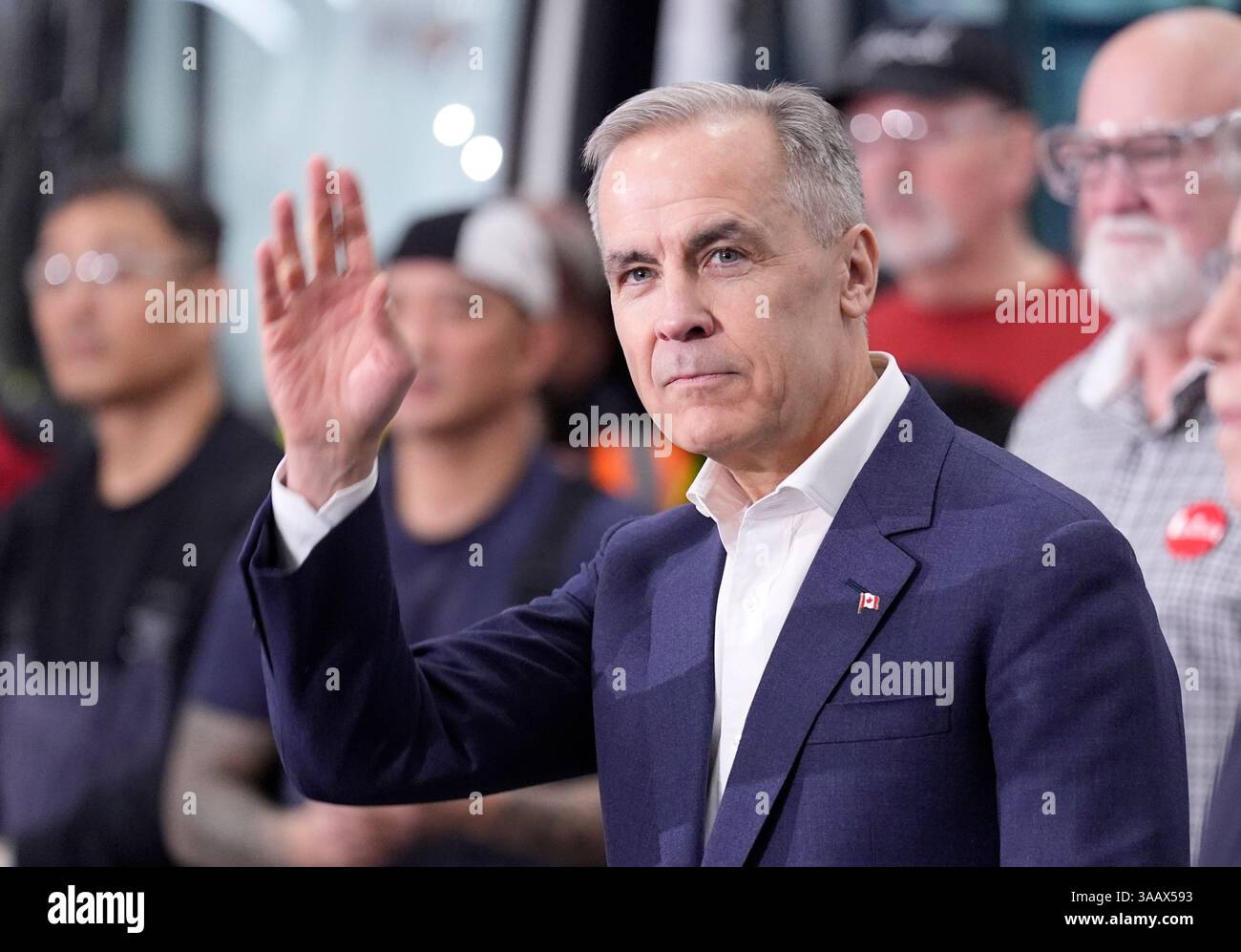 Winnipeg, Canada. 01st Apr, 2025. Liberal leader Mark Carney waves to ...