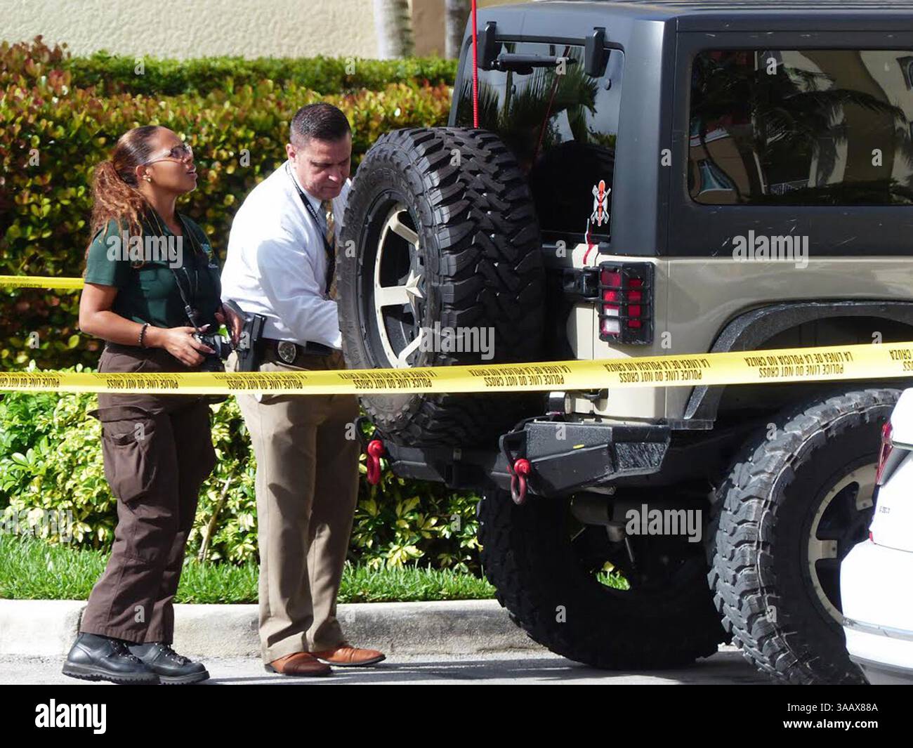 May 18, 2018 - USA - A Miami-Dade homicide detective and crime scene ...