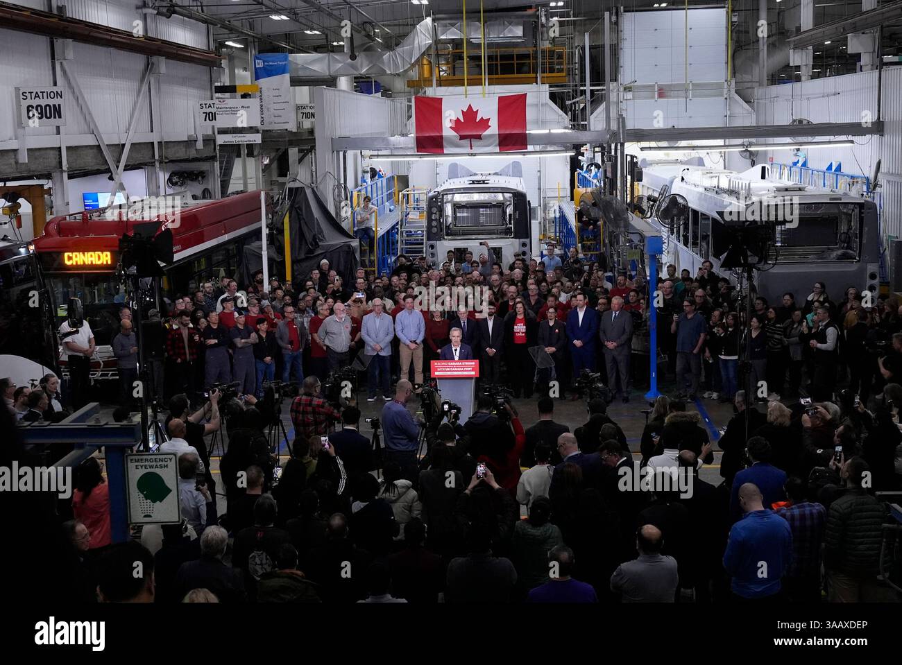 Liberal leader Mark Carney speaks during a campaign stop at a bus ...