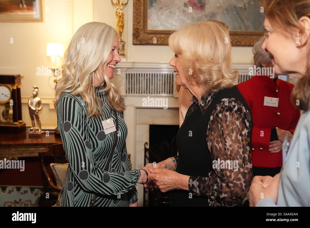 Queen Camilla, patron of SafeLives, talks with Ursula Lindenberg ...