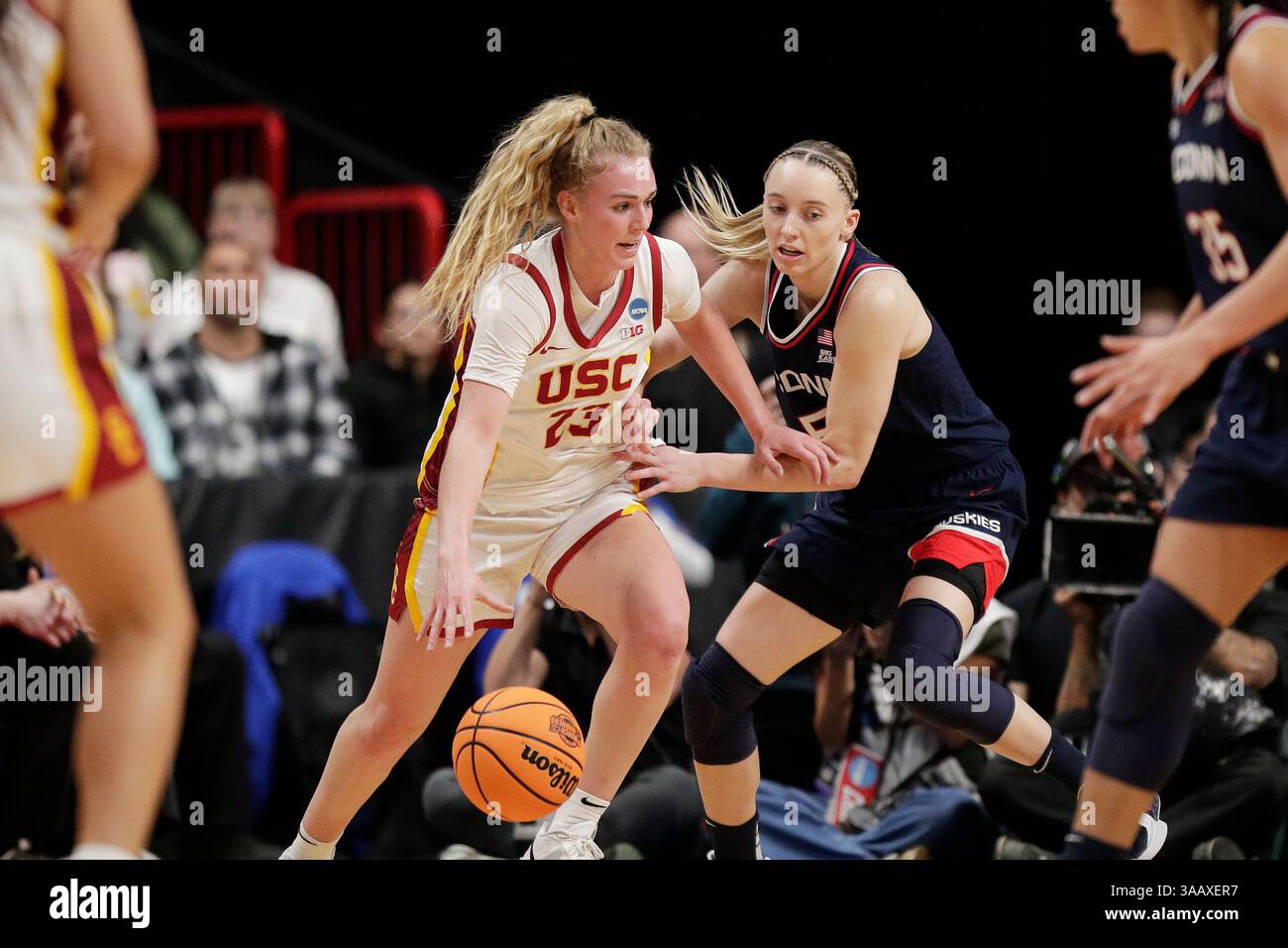 Southern California guard Avery Howell (23) controls the ball while ...