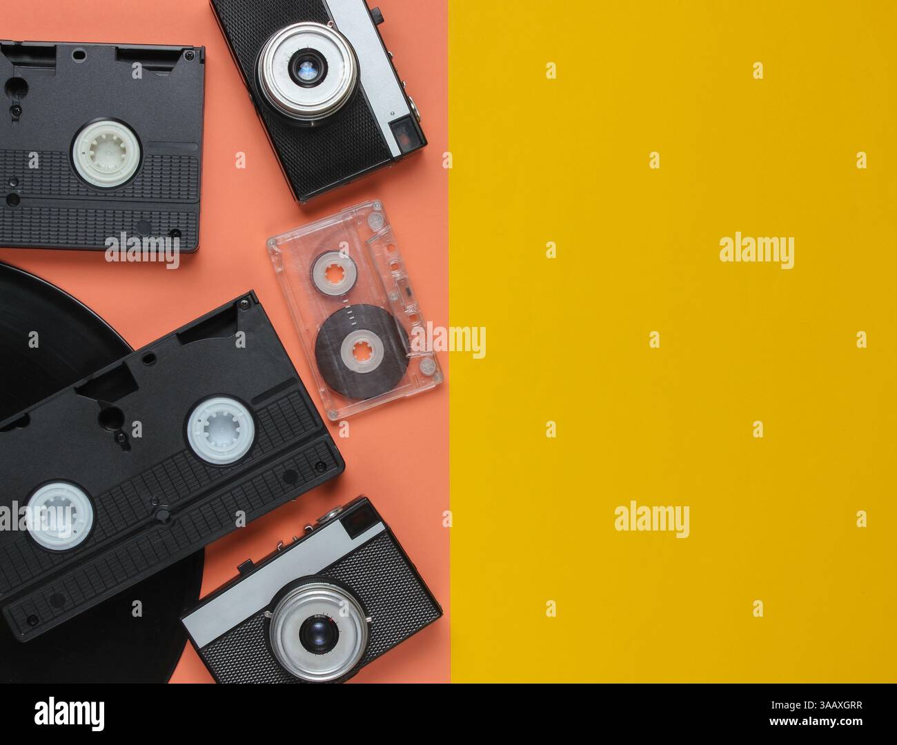 Retro objects. Retro camera, vinyl record, video cassettes, audio ...
