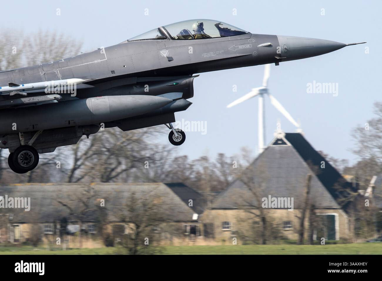 A U.S. Air Force F-16C fighter jet prepares to touch down at Leeuwarden Air Base, The ...