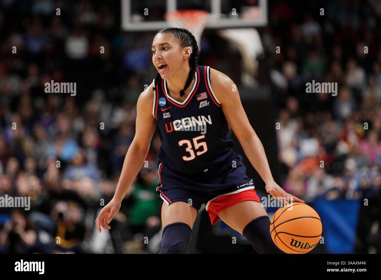 UConn guard Azzi Fudd (35) controls the ball during the first half ...