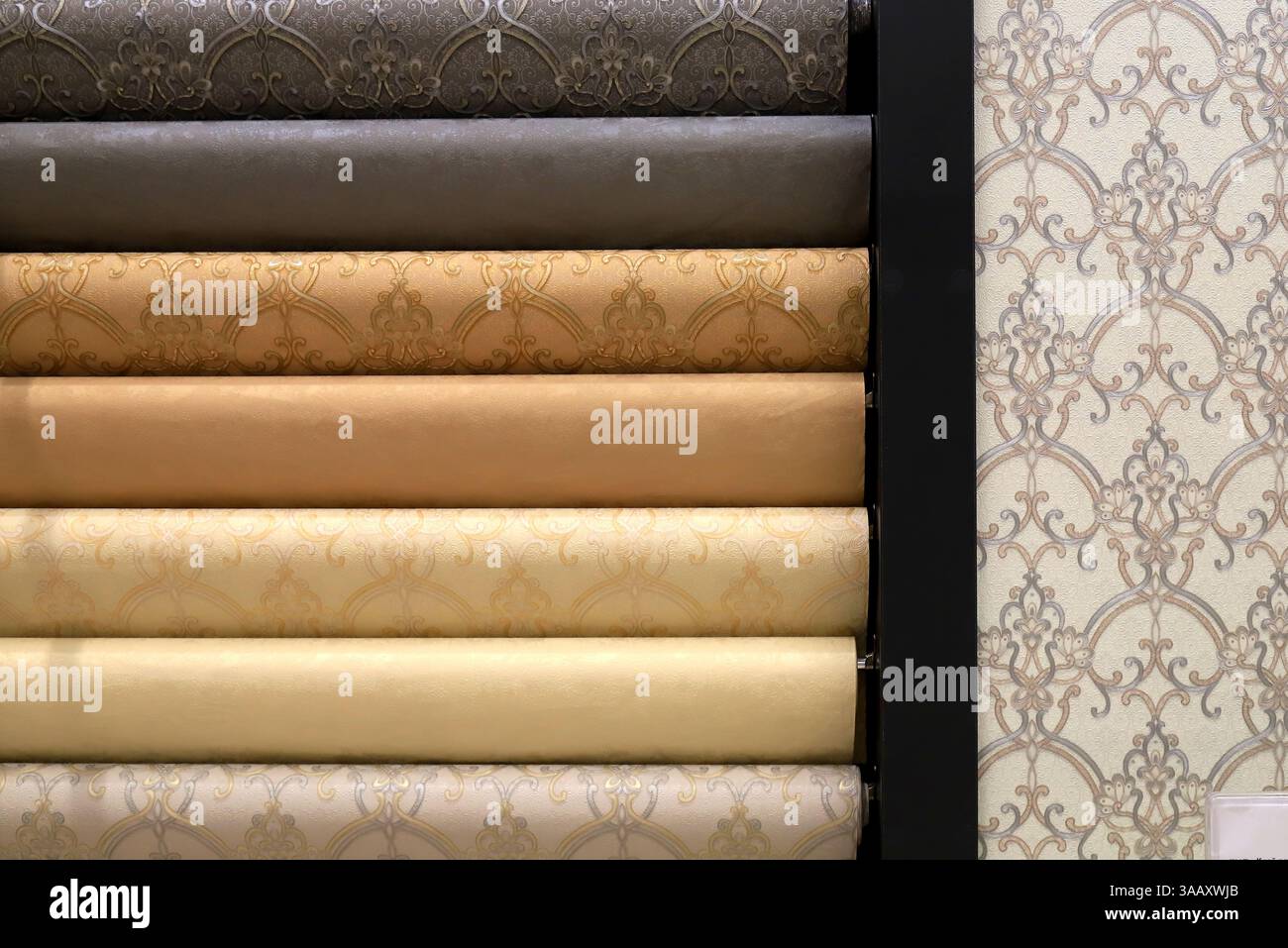 Wallpaper for the wall. Rolled up rolls of expensive, high quality ...