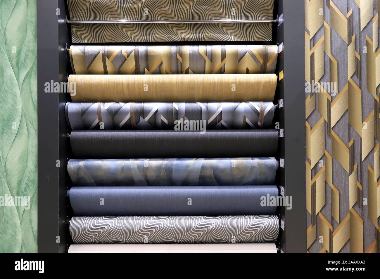 Wallpaper for the wall. Rolled up rolls of expensive, high quality ...