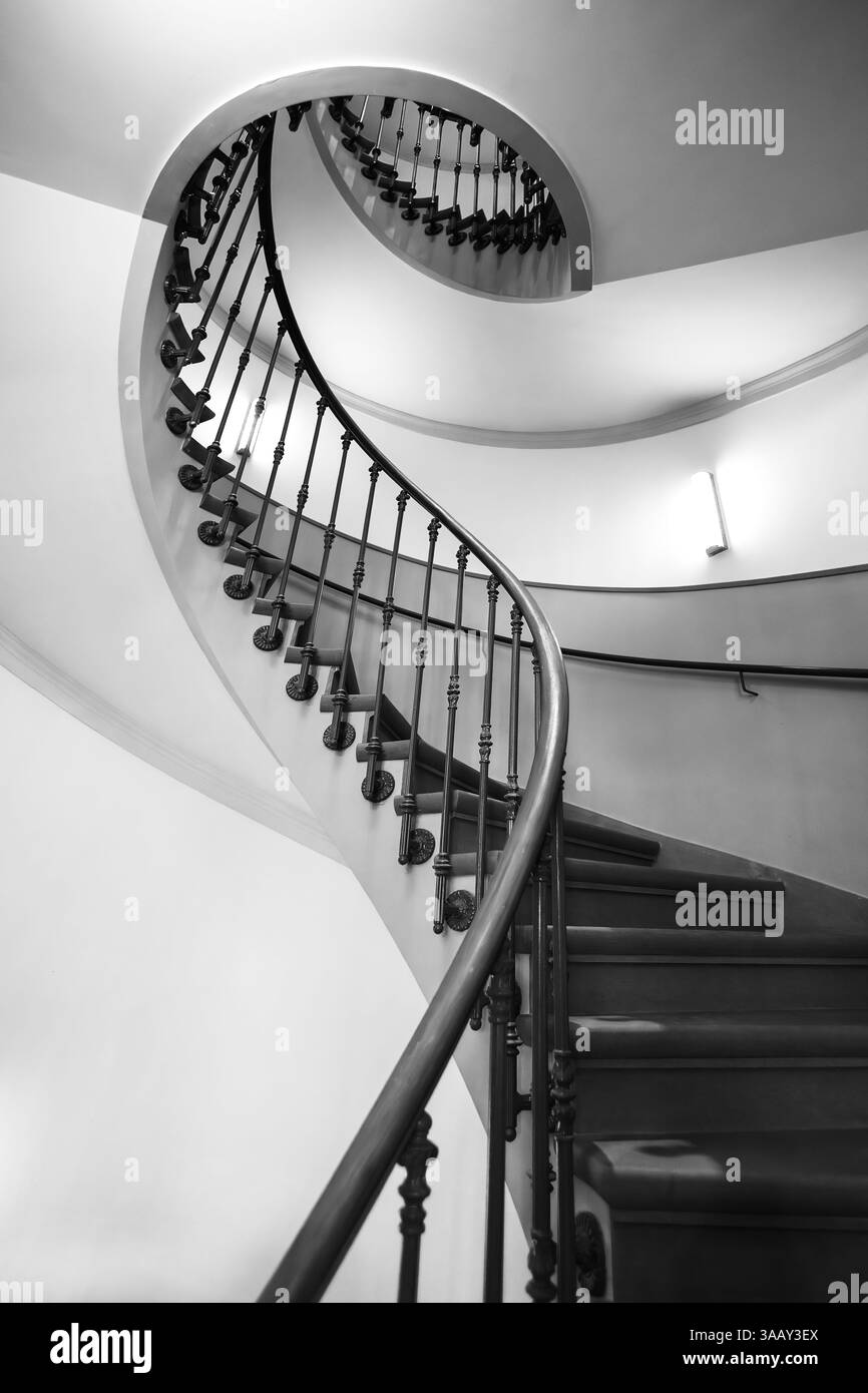 Switzerland - June 19..2024: Spiral staircase with bottom view forming ...