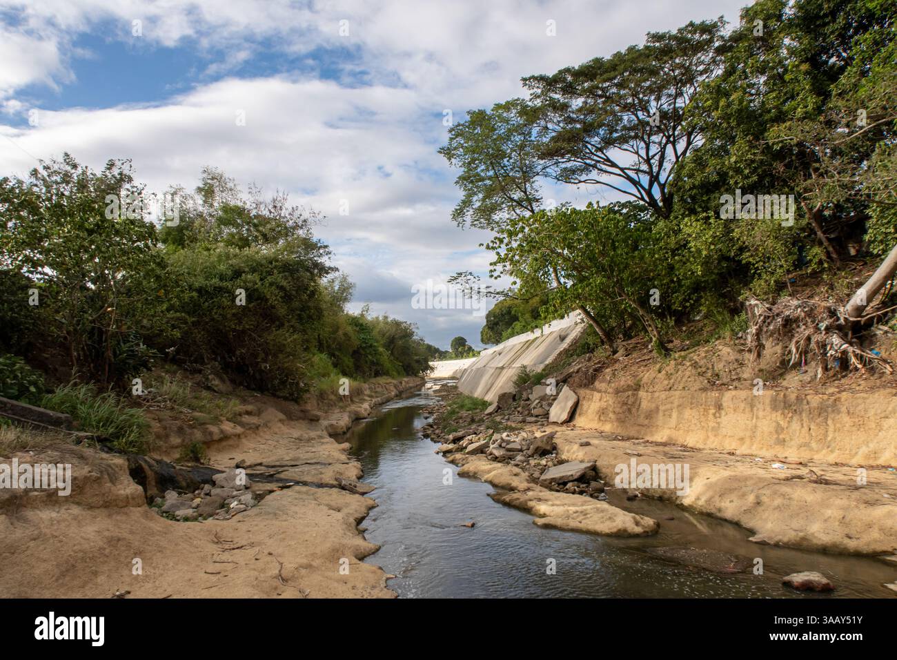 The Ylang Ylang River in Cavite, Philippines, is at a low water level ...