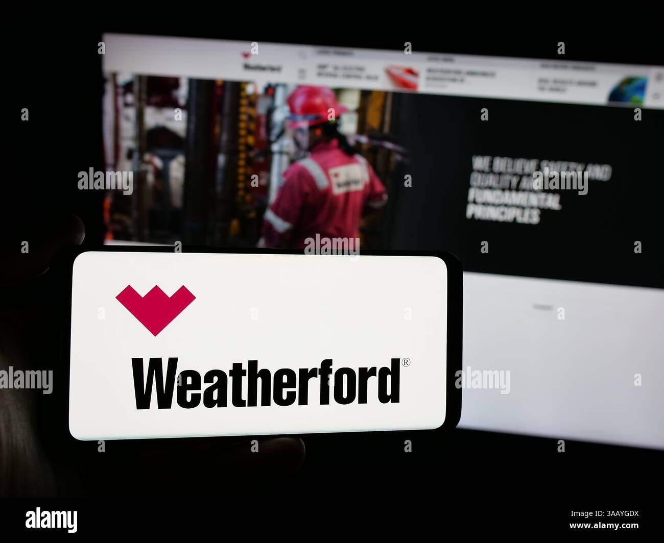 In this photo illustration, a smartphone with the logo of US oilfield ...