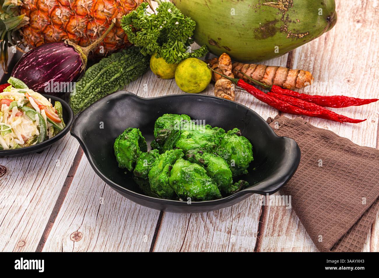 Indian green chicken mint tikka barbecue Stock Photo - Alamy