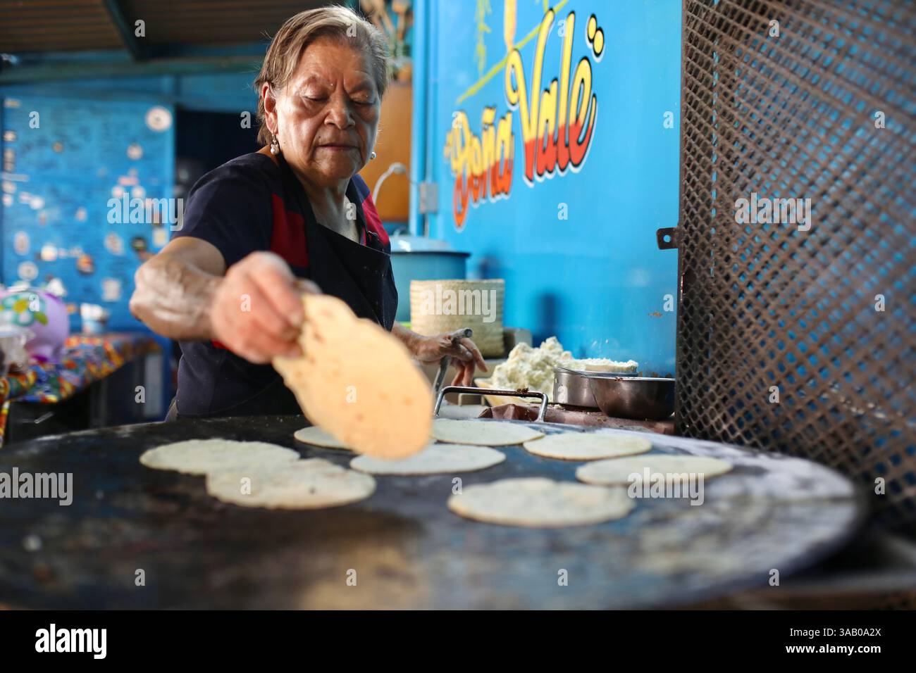 Oaxaca, Mexico. 4th Mar, 2025. DoÃ±a Vale, a street vendor made famous ...