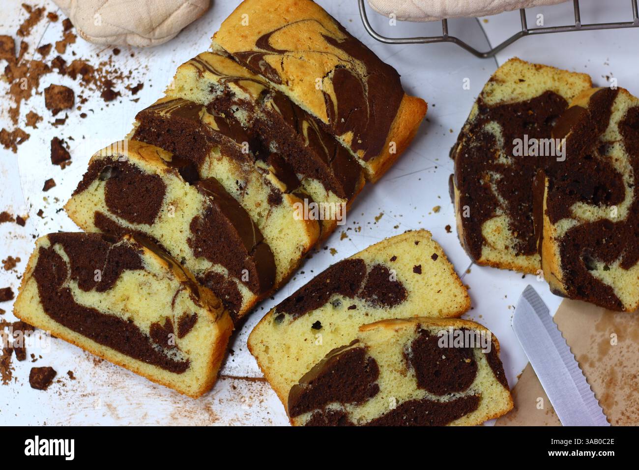 Slices of moist marble cake with chocolate and vanilla swirls, placed ...