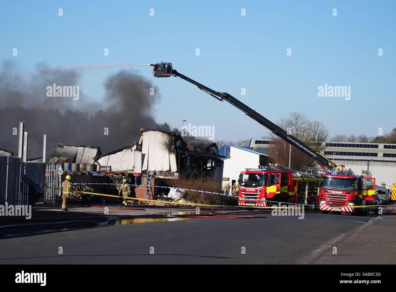 Fire fighters at the scene of a fire at an industrial unit in Broomlee ...