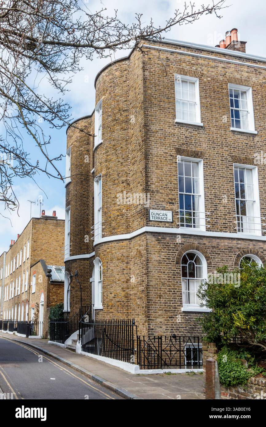 A Georgian residential property with curved bow windows on the corner ...