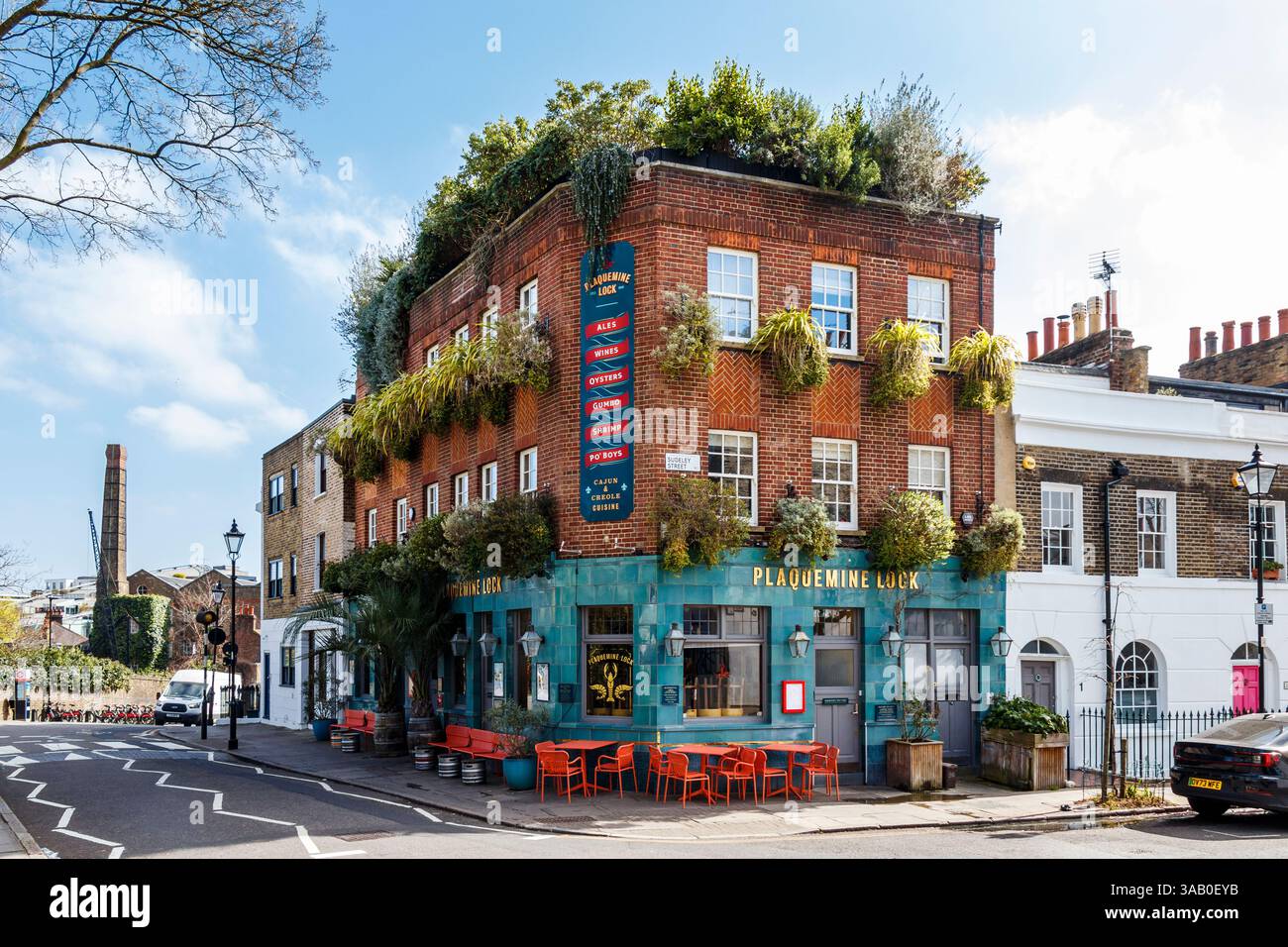 The Plaquemine Lock pub, with planted window boxes and green roof, at ...