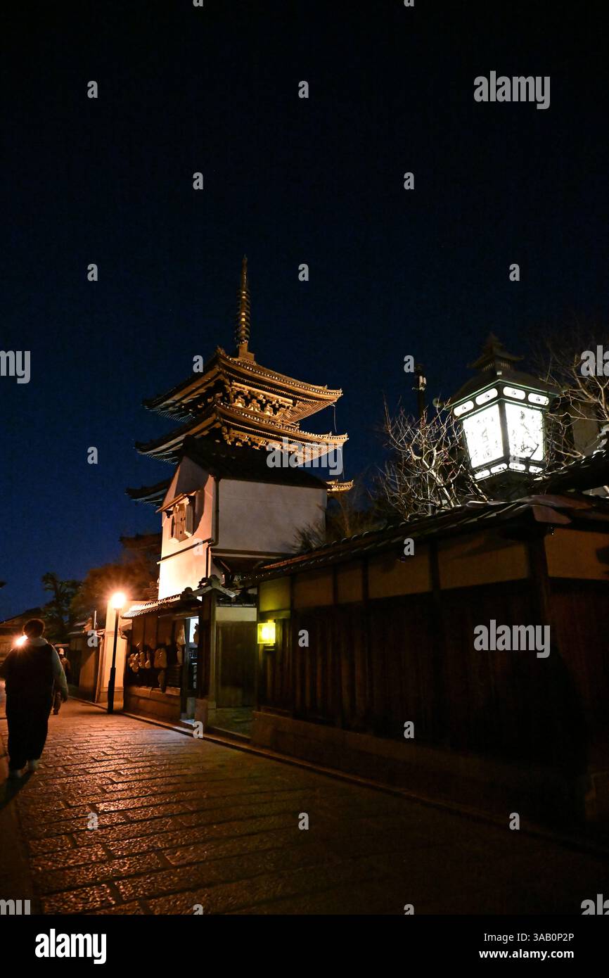 Yasaka Pagoda at twilight in Kyoto, Japan – traditional streets and illuminated temple during ...