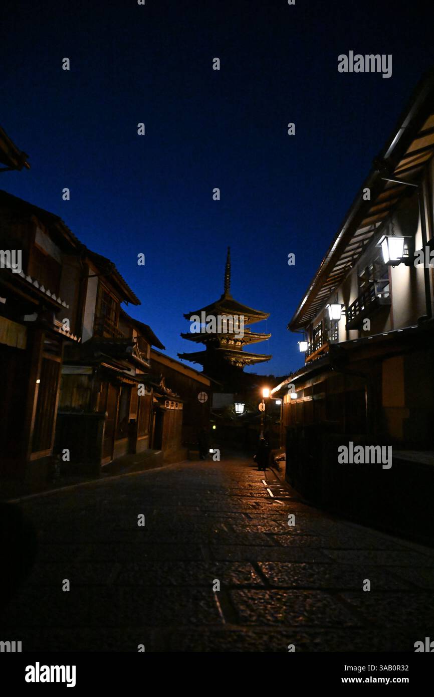 Yasaka Pagoda at twilight in Kyoto, Japan – traditional streets and illuminated temple during ...