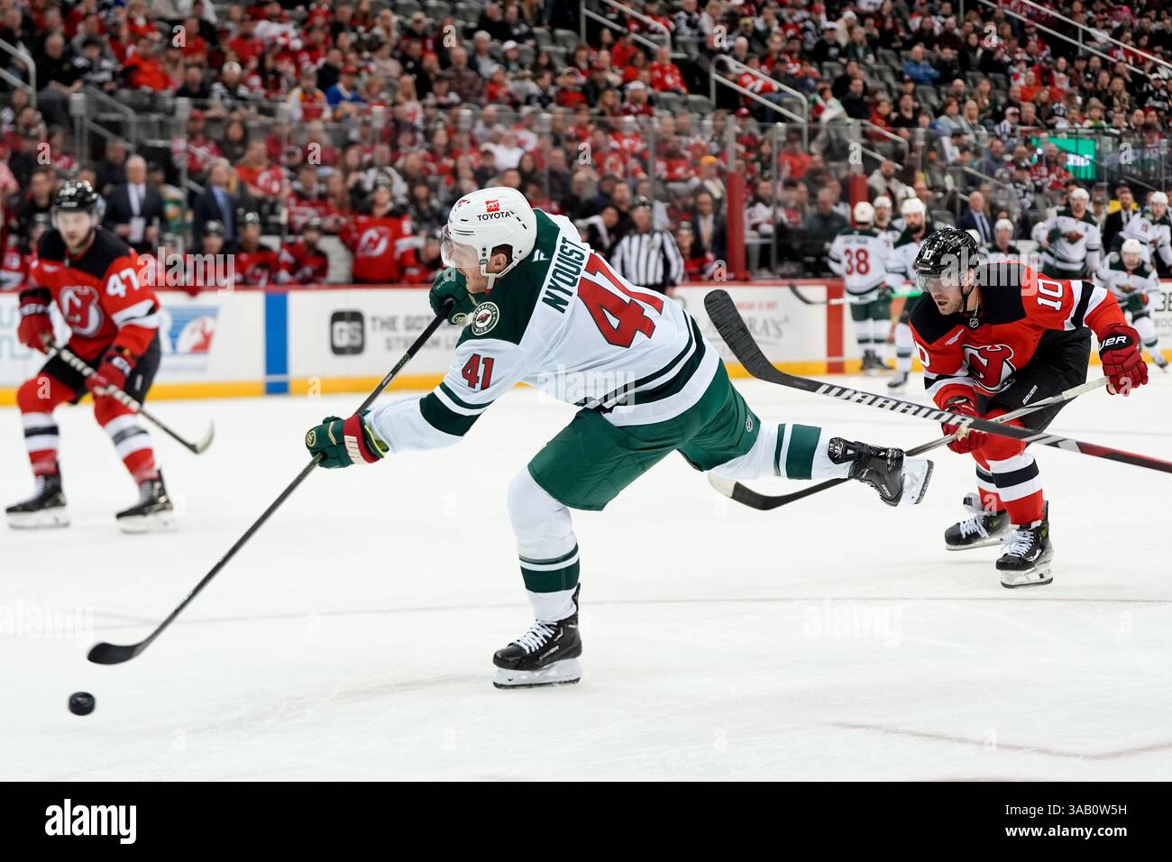 Minnesota Wild center Gustav Nyquist (41) shoots on New Jersey Devils ...