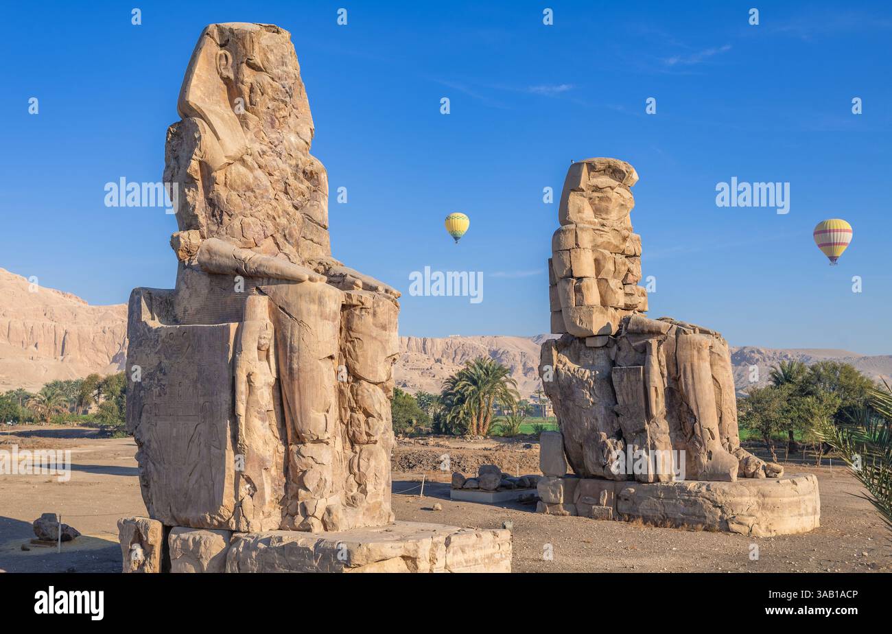 The Colossi of Memnon, two massive stone statues of the Pharaoh ...